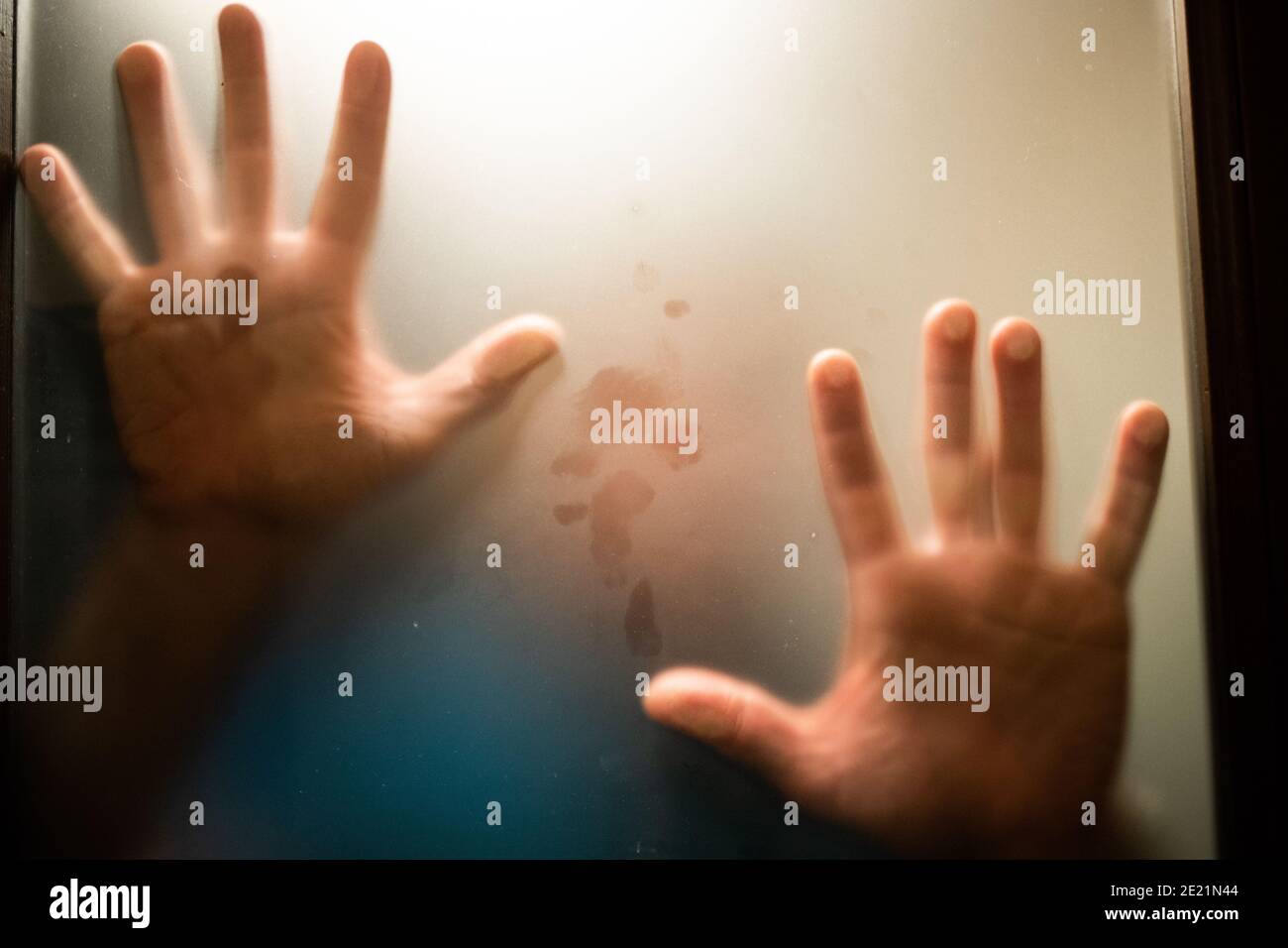 scary picture of hands behind glass Stock Photo - Alamy