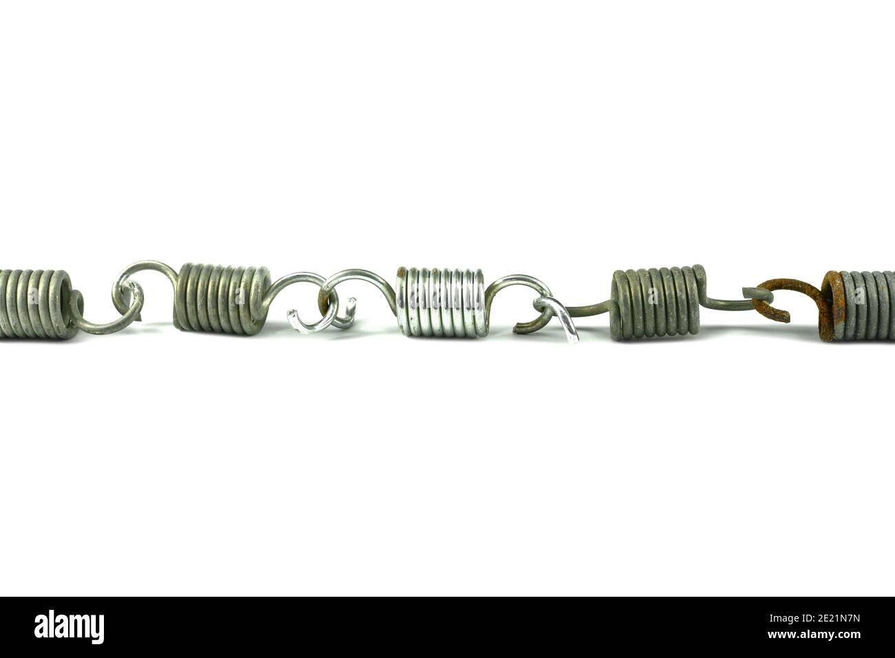 Metal spring isolated on white Stock Photo - Alamy