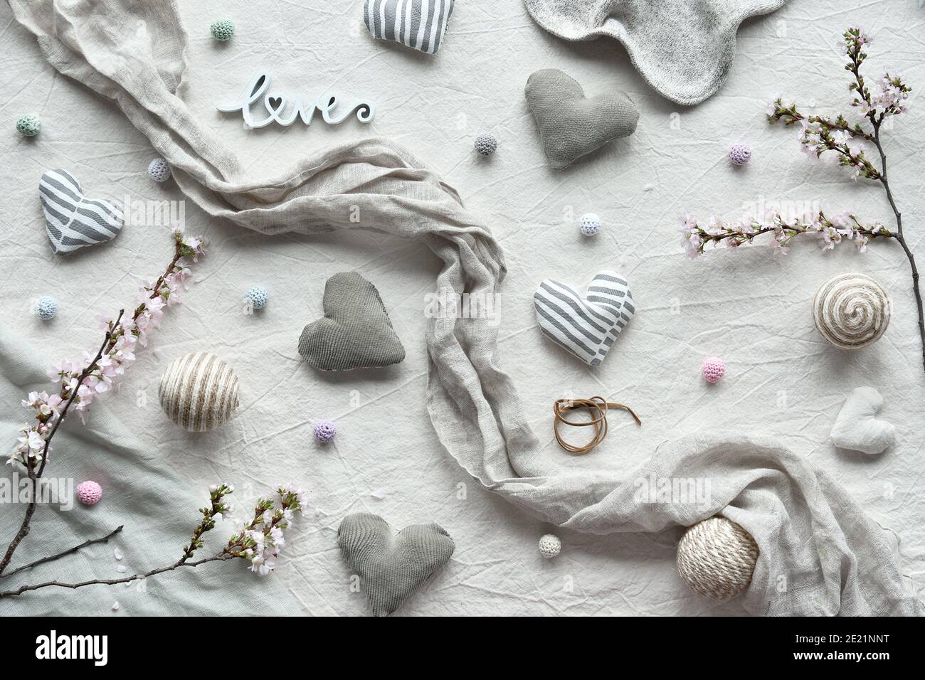 Hand made linen hearts and balls on linen background. Textile ...