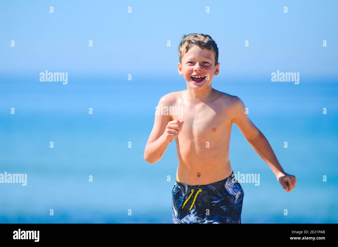 Happy children at the seaside hi-res stock photography and images - Alamy