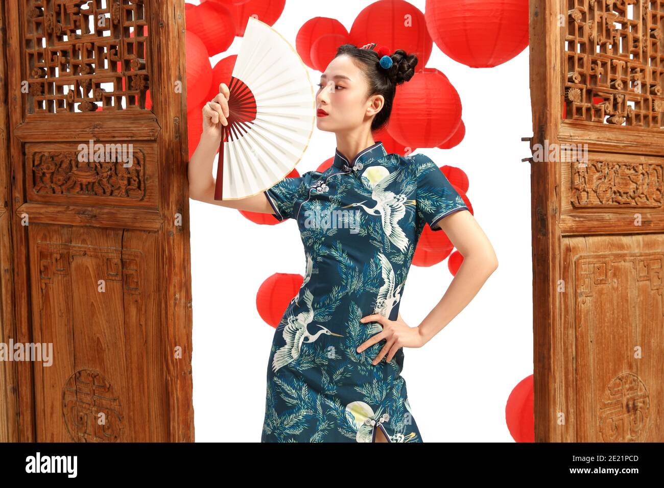 Beautiful woman with a fan Stock Photo - Alamy