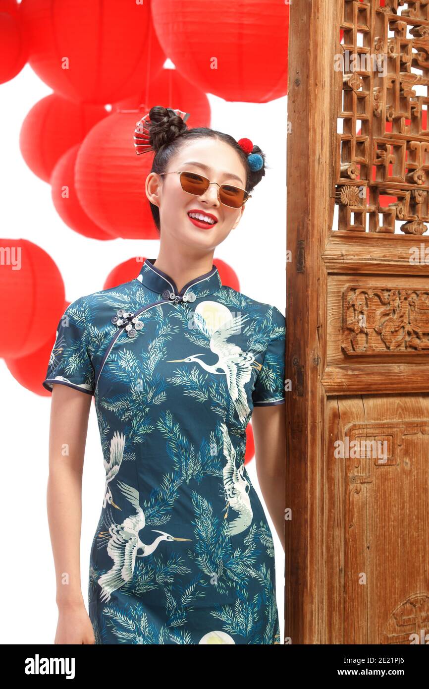 Beautiful woman standing in front of the Chinese style Stock Photo - Alamy