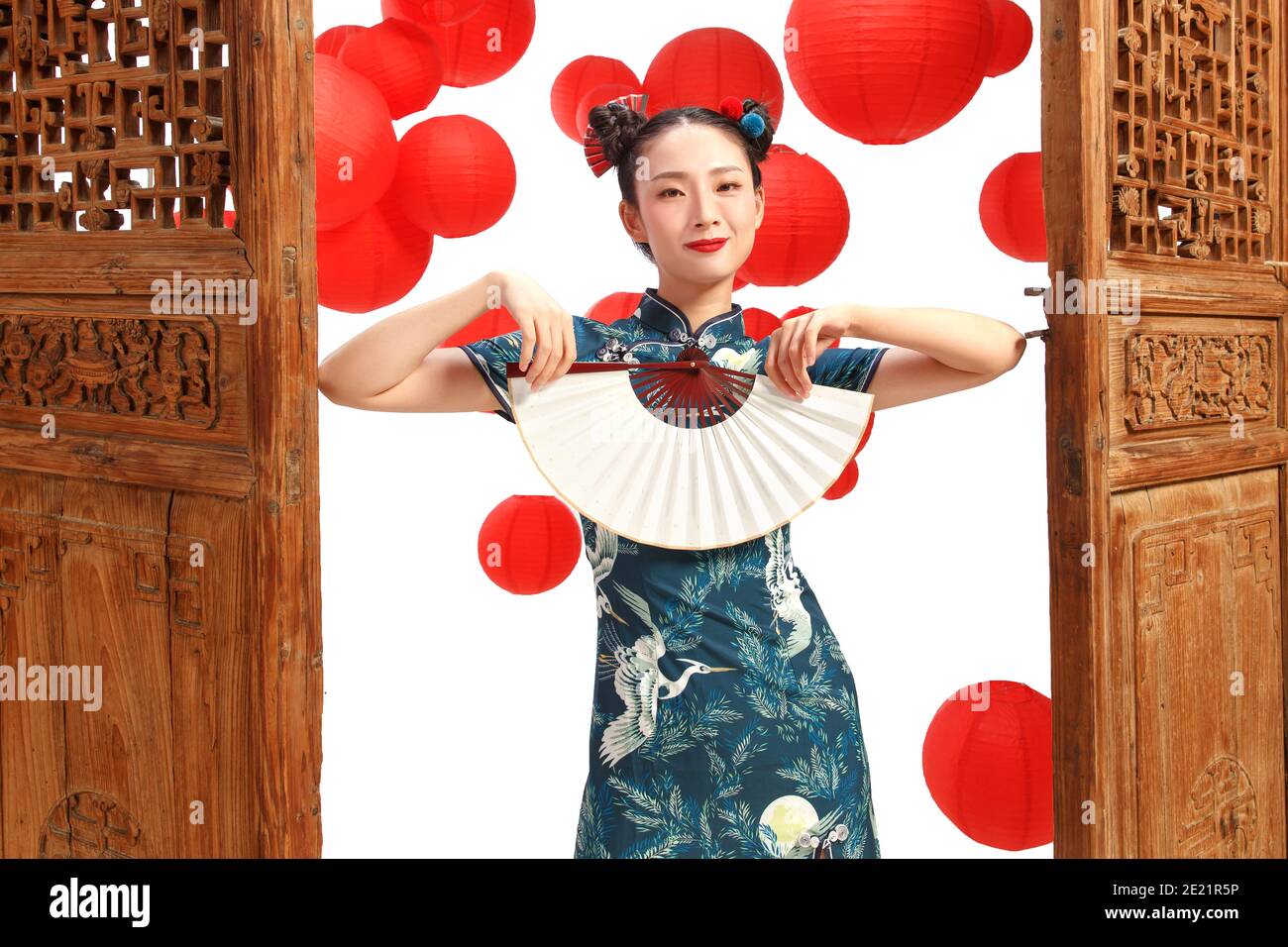 Beautiful woman with a fan Stock Photo - Alamy