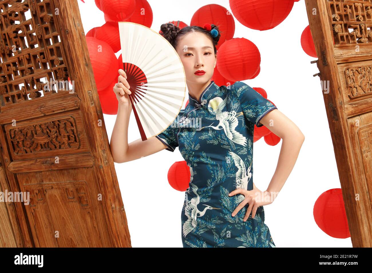 Beautiful woman with a fan Stock Photo - Alamy