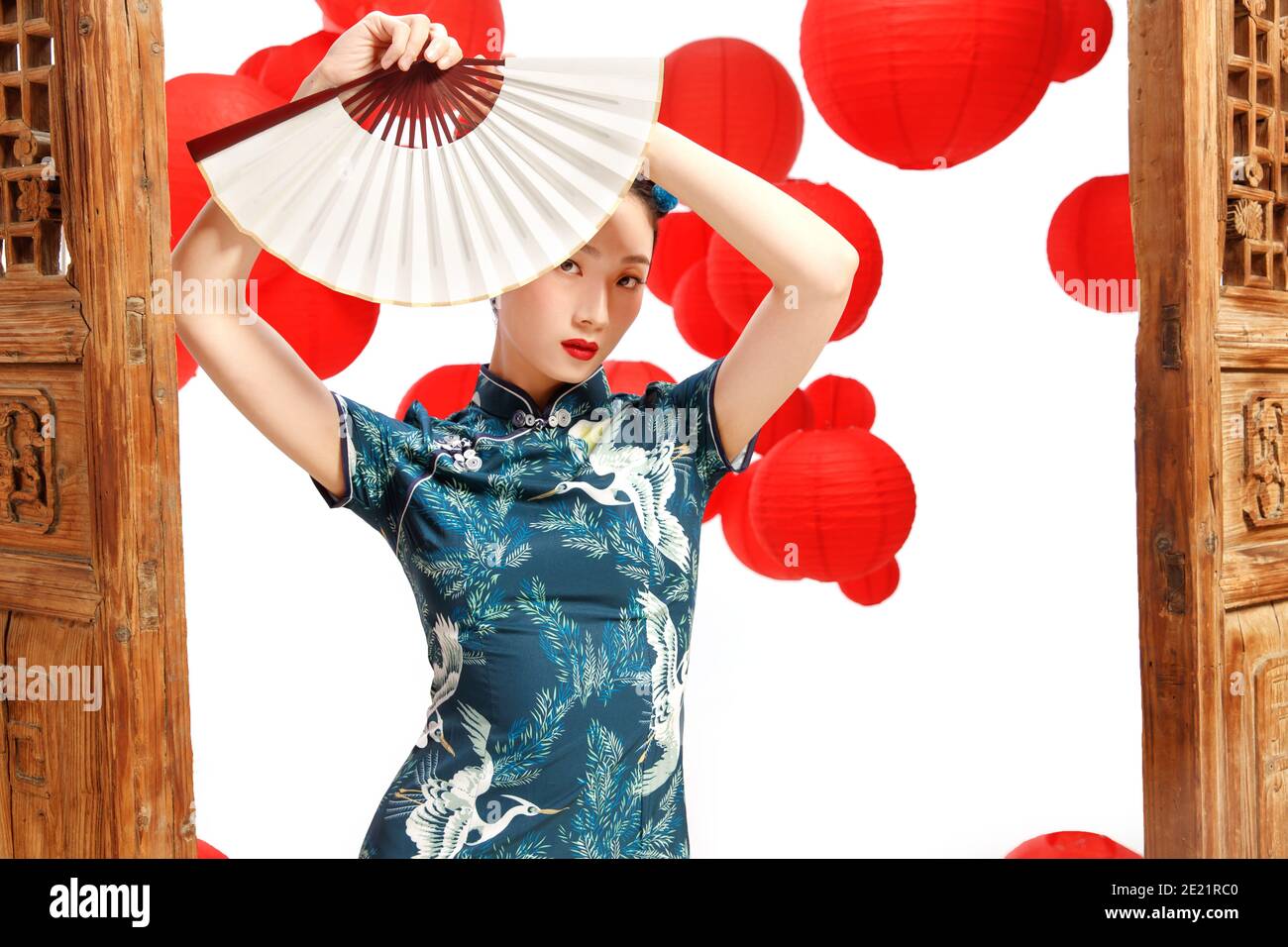 Beautiful woman with a fan Stock Photo - Alamy