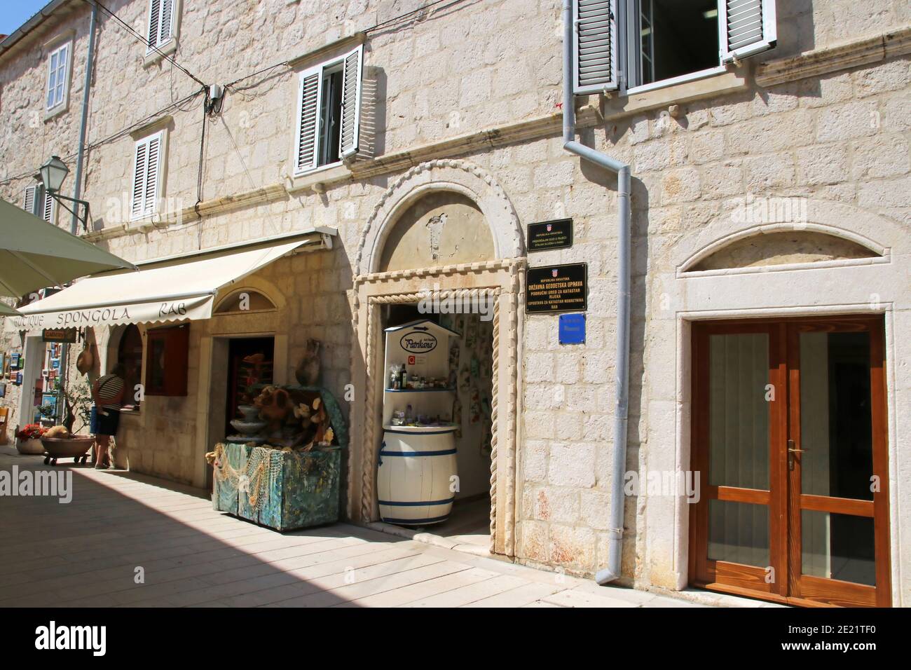 beautiful stone building in the venetian style on an empty street Rab ...