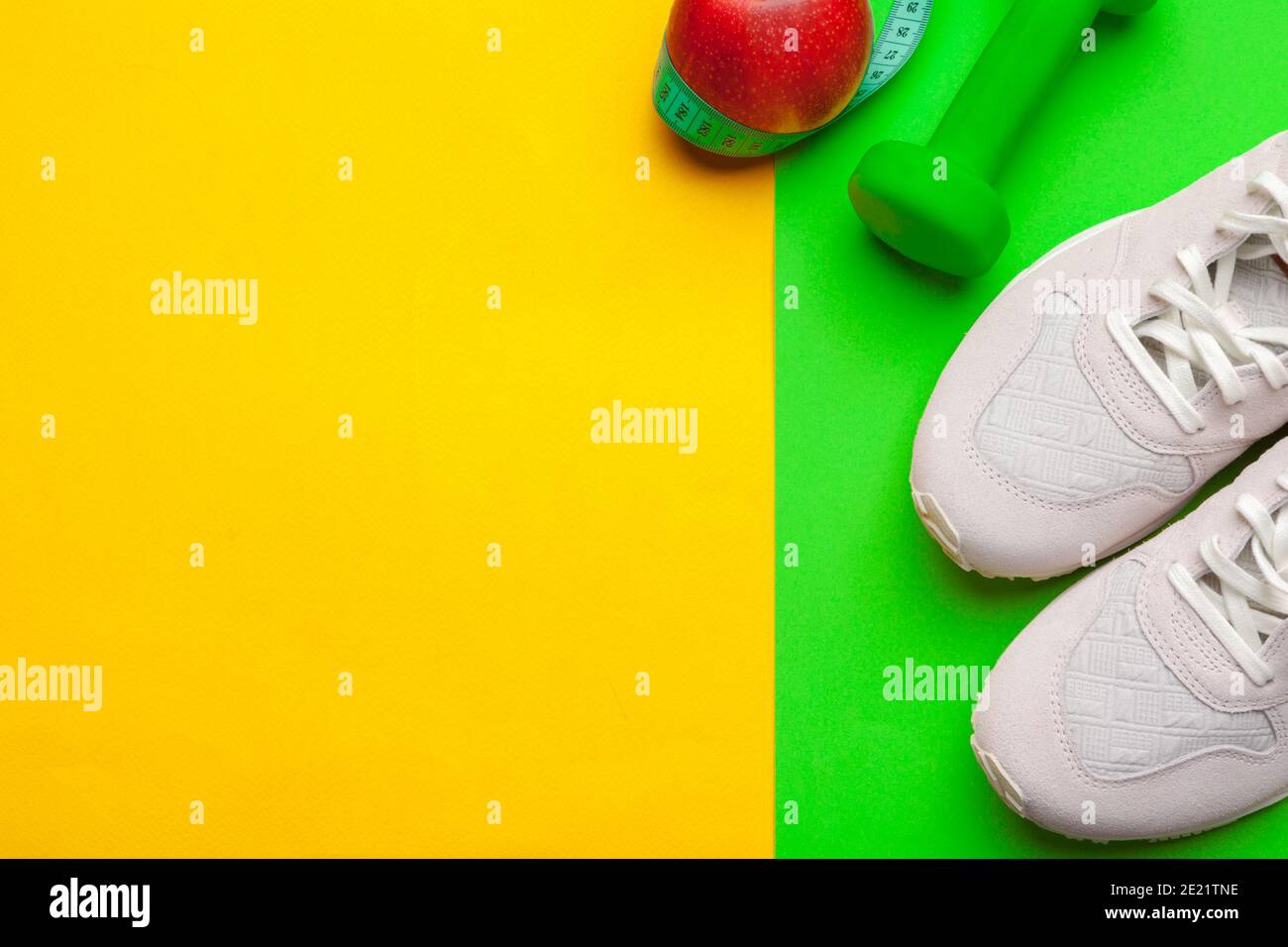 Fitness Gym equipment on color background Stock Photo - Alamy