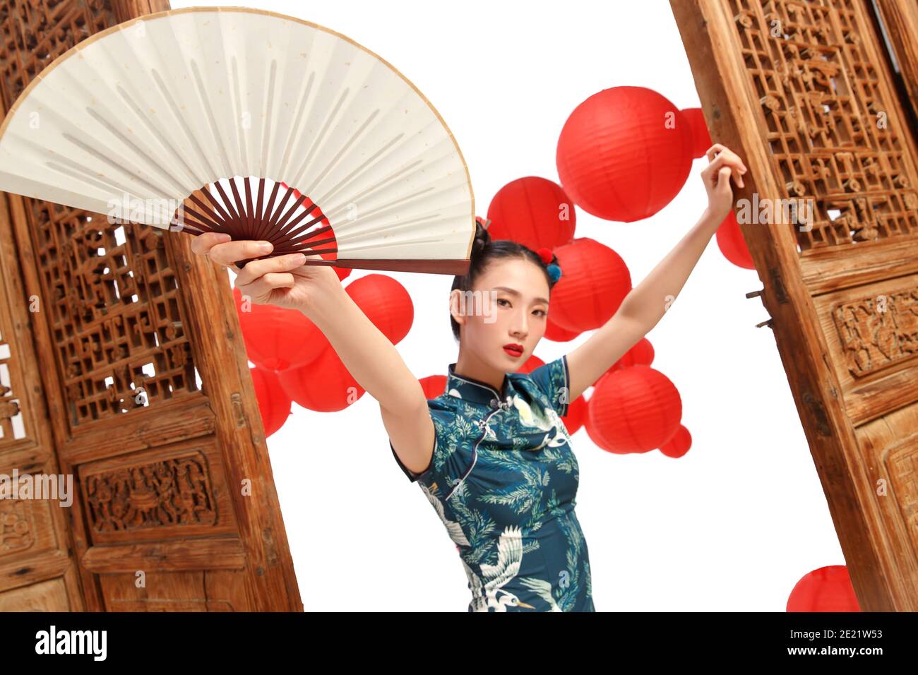 Beautiful woman with a fan Stock Photo - Alamy