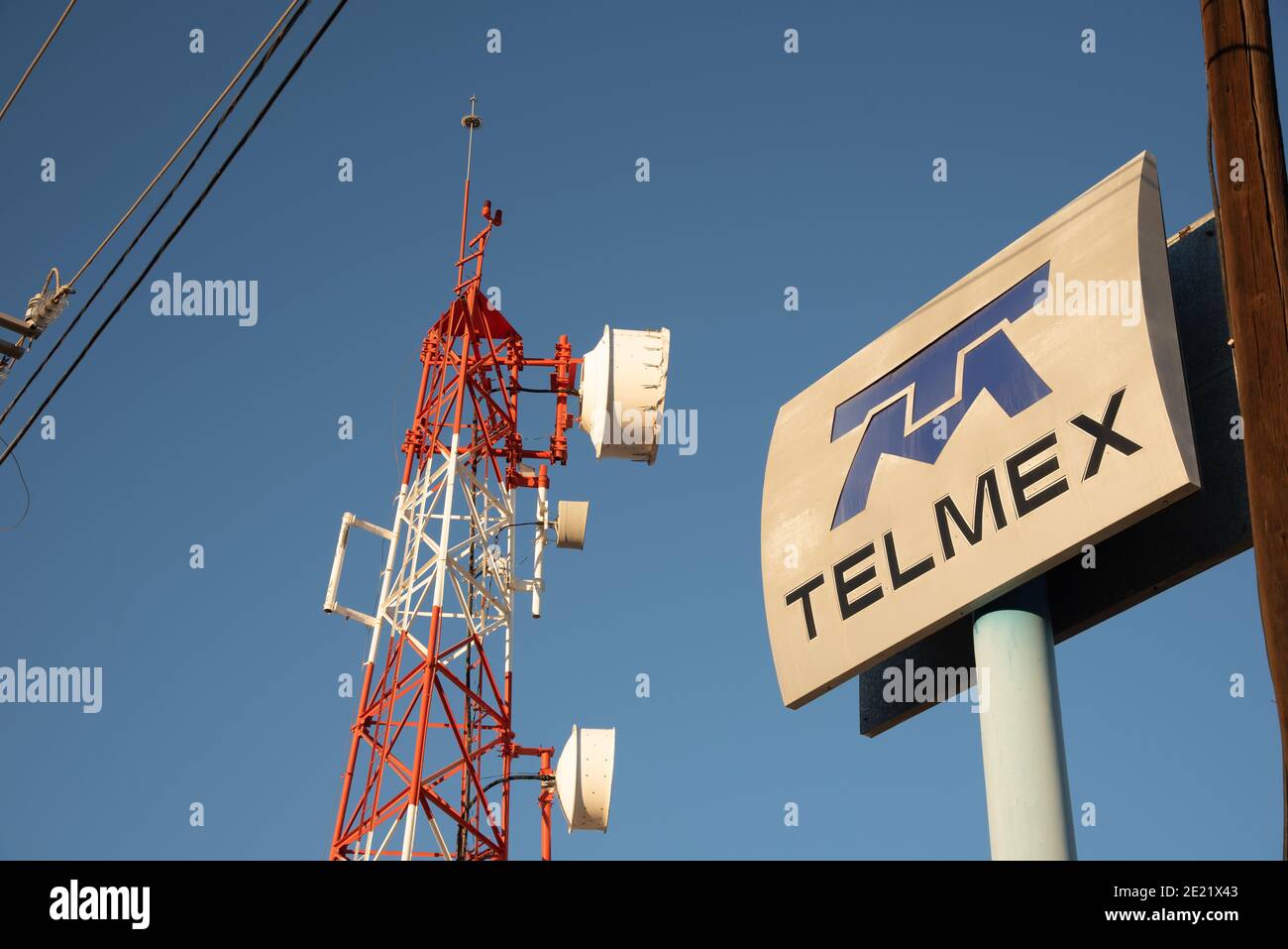 A cell tower and sign for Mexican cellular company, Tel Mex Stock Photo ...