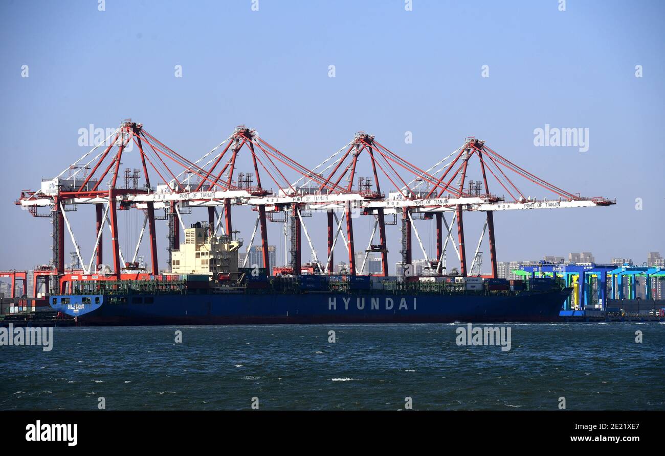 Tianjin. 11th Jan, 2021. A container ship is seen at the Euro-Asian ...