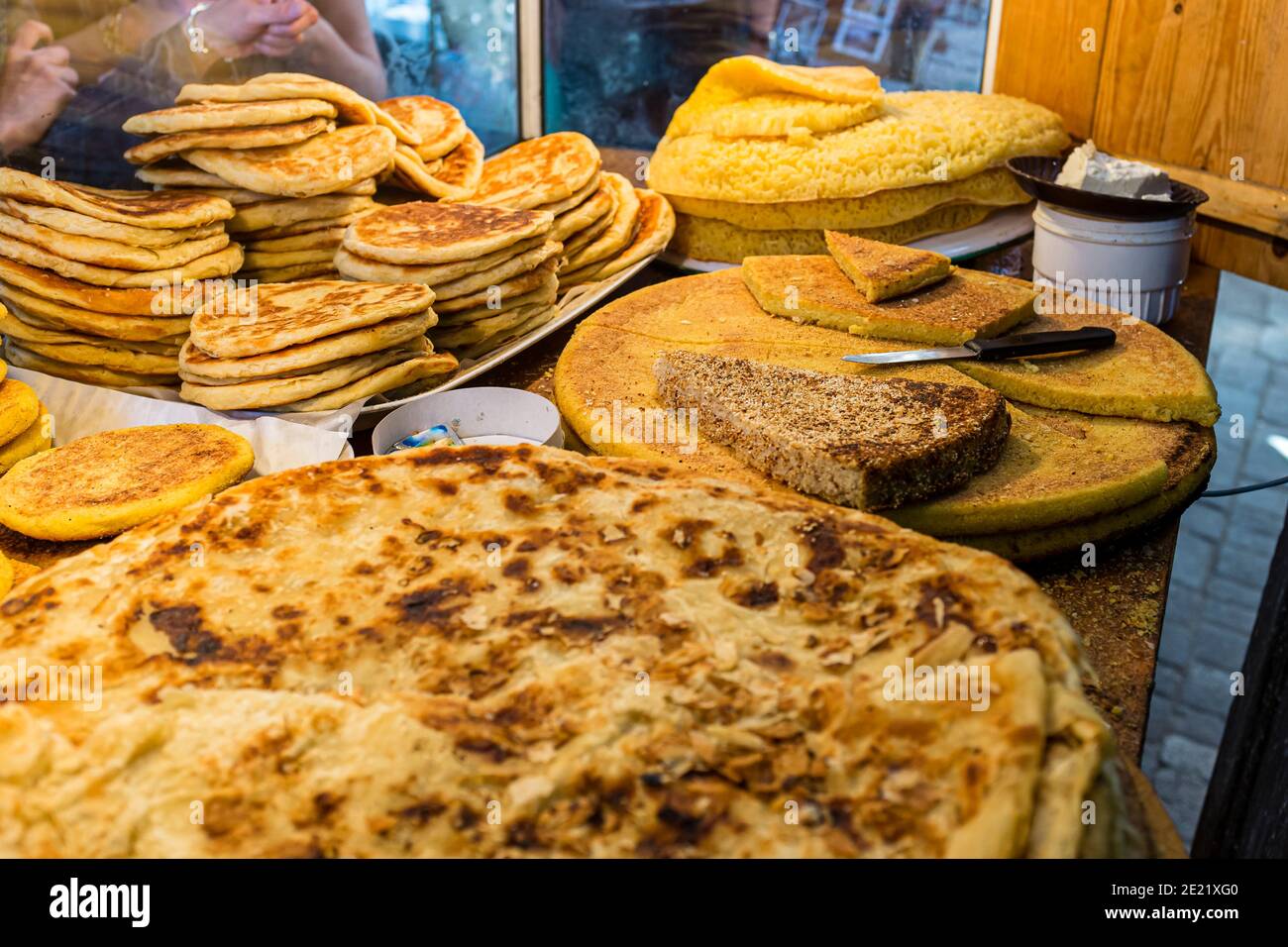 Moroccan bakery goods for sale in the Medina of Fez including beghrir ...