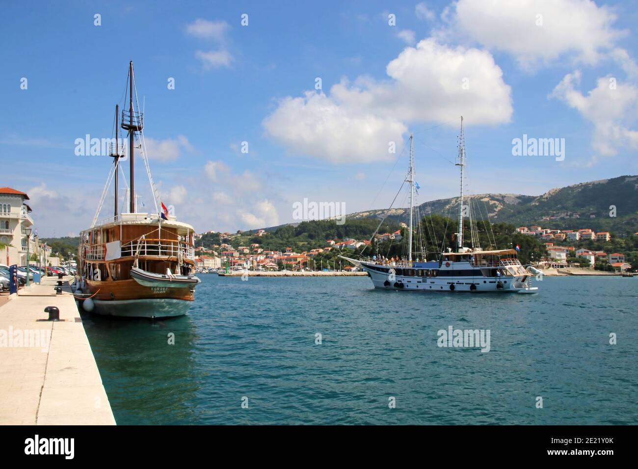 Konobe moored in the harbour, Rab town ,Rab island Croatia Stock Photo ...