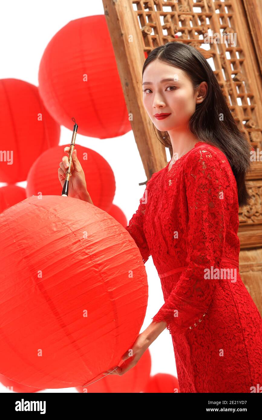 The beautiful women writing in red lanterns Stock Photo - Alamy