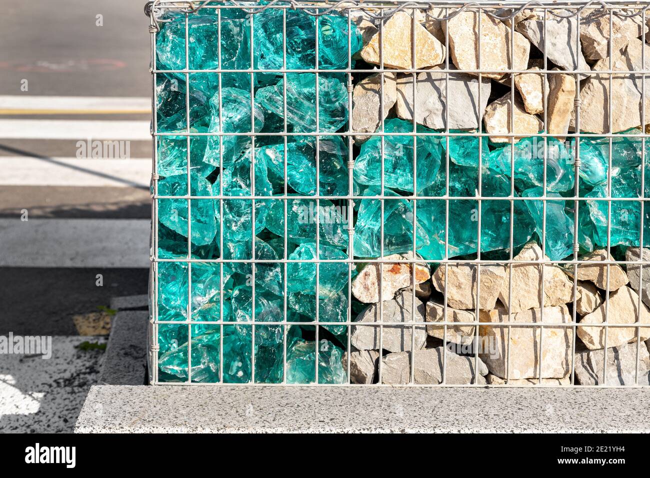 Close-up detail of new modern beautiful gabion fence with metal cage ...