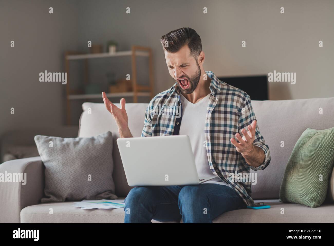 Photo of young business man unhappy sad angry mad shout problem mistake ...