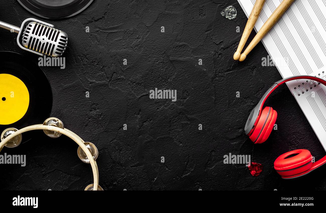 Flat lay of music background - instrument with sheet music, top view ...