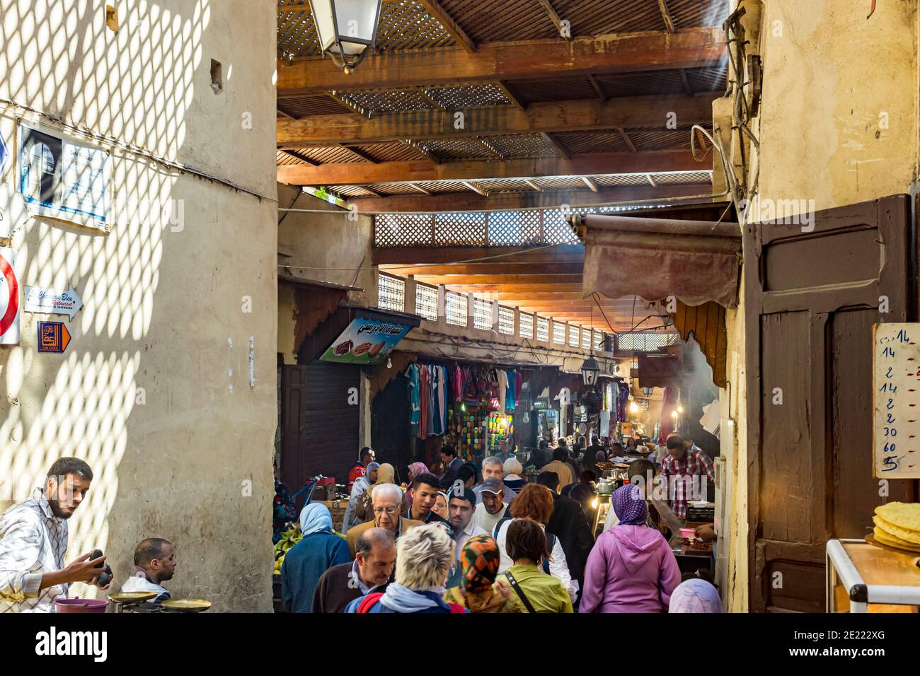 The busy and crowded souk in the Medina of Fes in Morocco Stock Photo ...