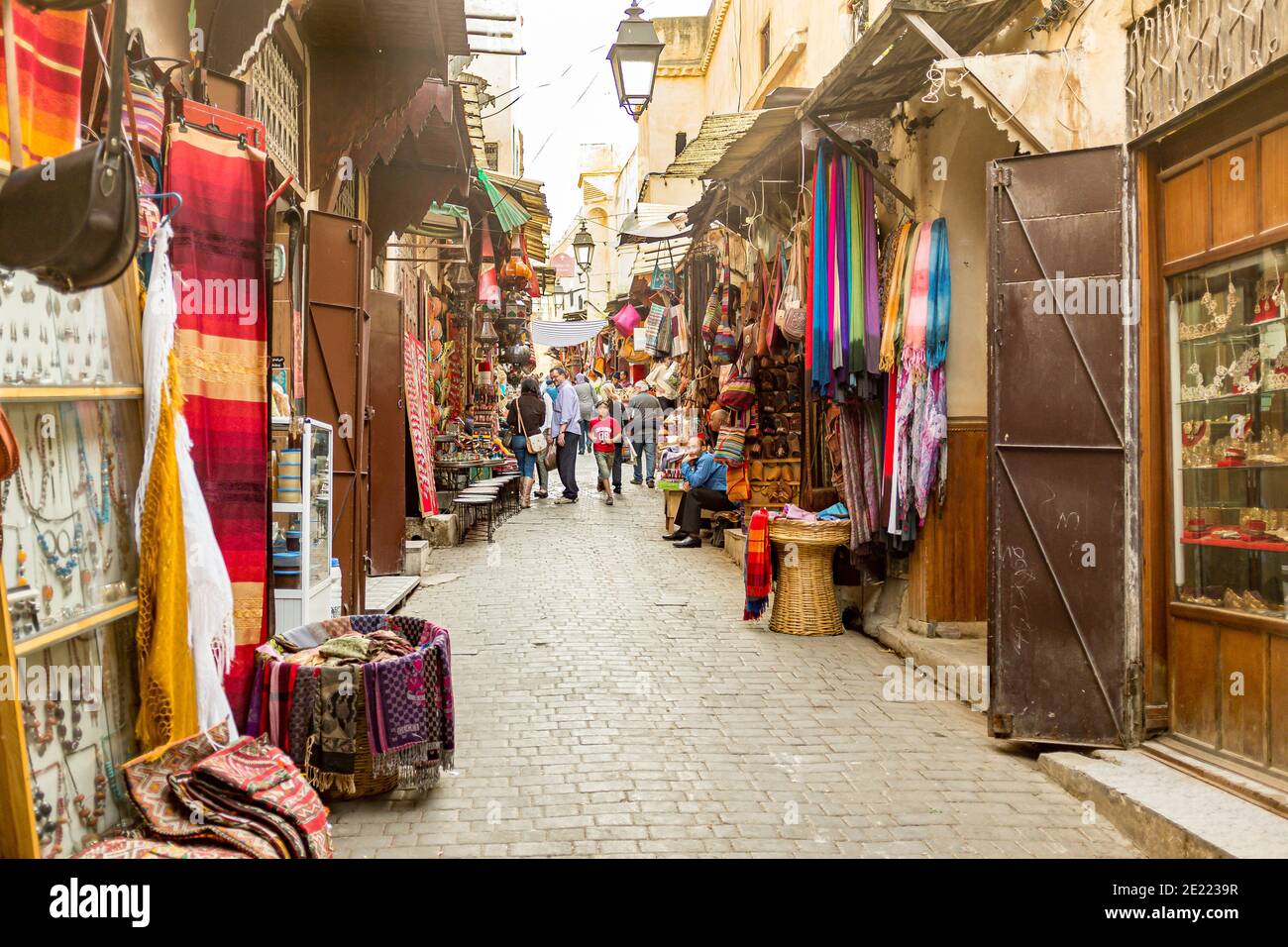 The busy and crowded souk in the Medina of Fes in Morocco Stock Photo ...