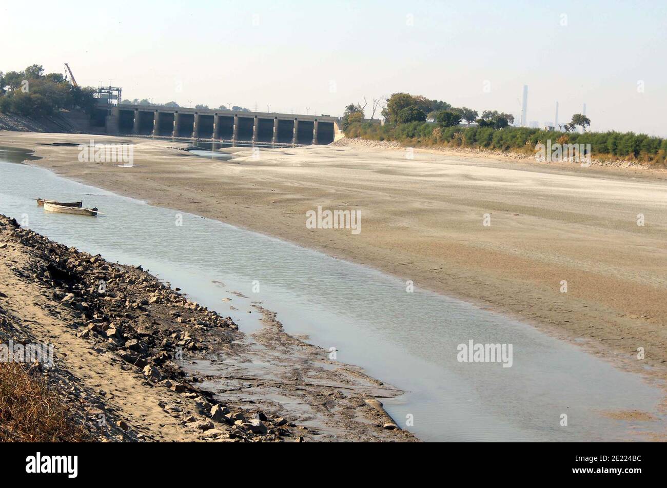 Dried bed of dam indicating for high risks of shortage of water in ...