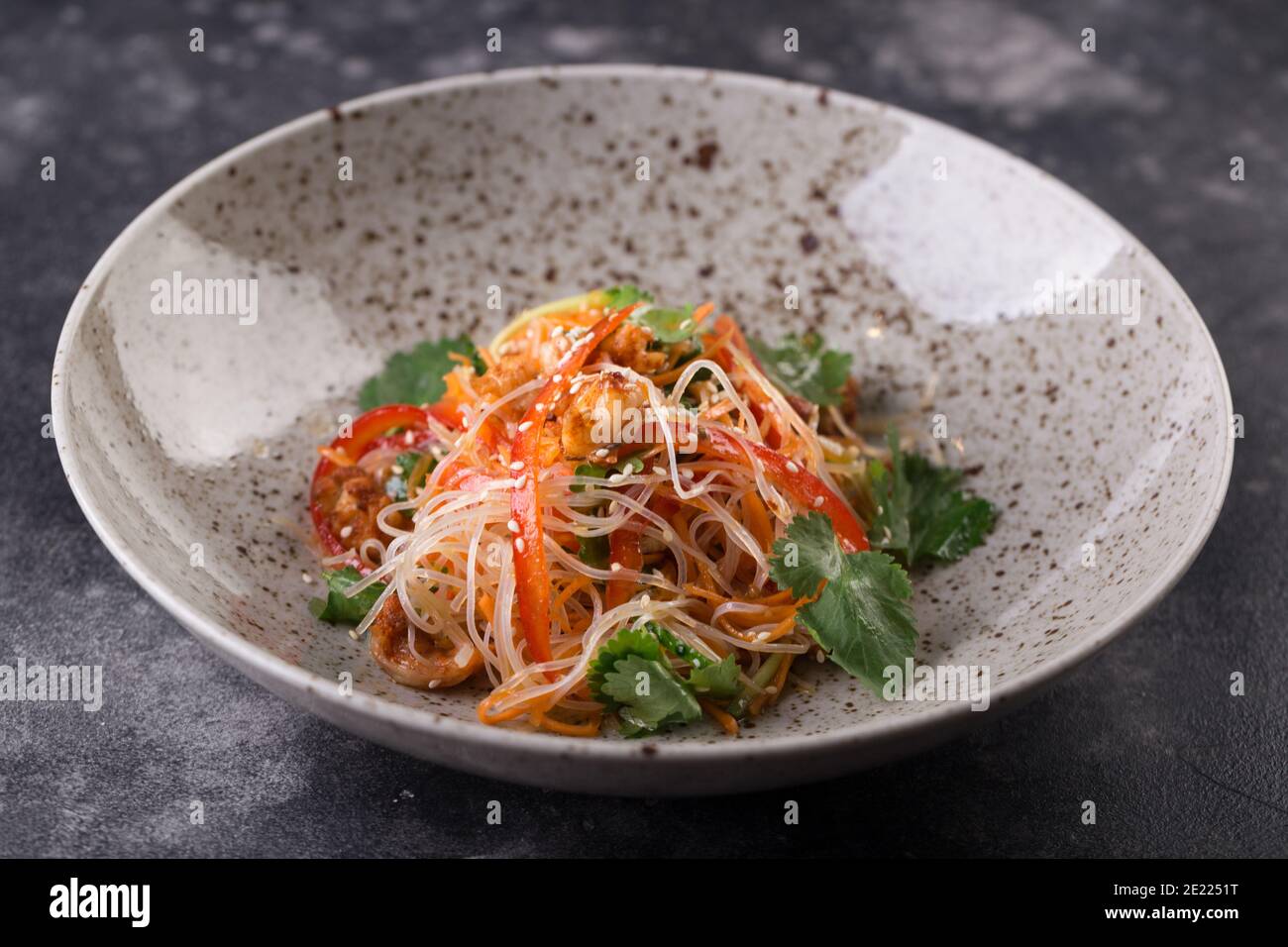 Funchose salad with shrimps and vegetables with sesame seeds. Photo for ...