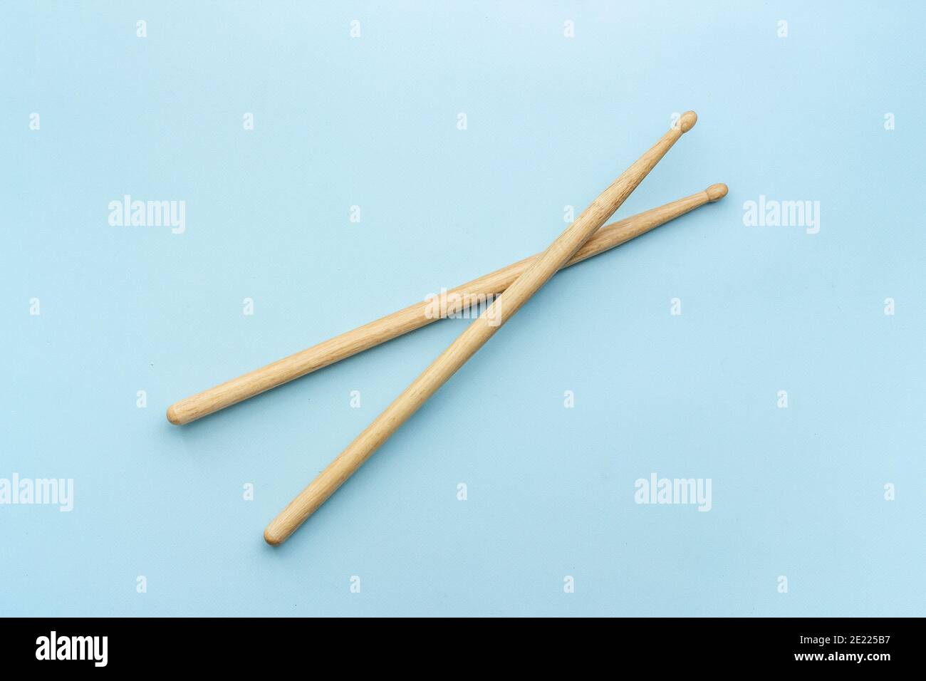 Two wooden drum sticks, top view. Music background Stock Photo - Alamy