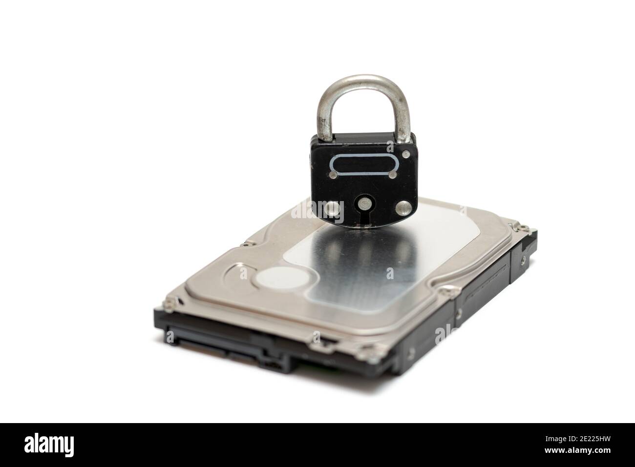 Computer hard disk and metal padlock symbolizing concept for encrypted ...