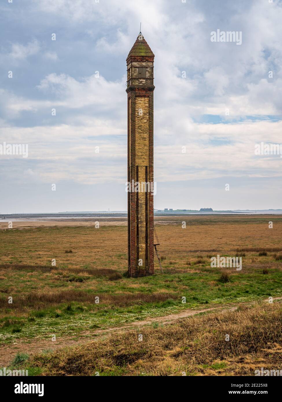 The Rampside Lighthouse with a view towards Roa Island, Cumbria ...