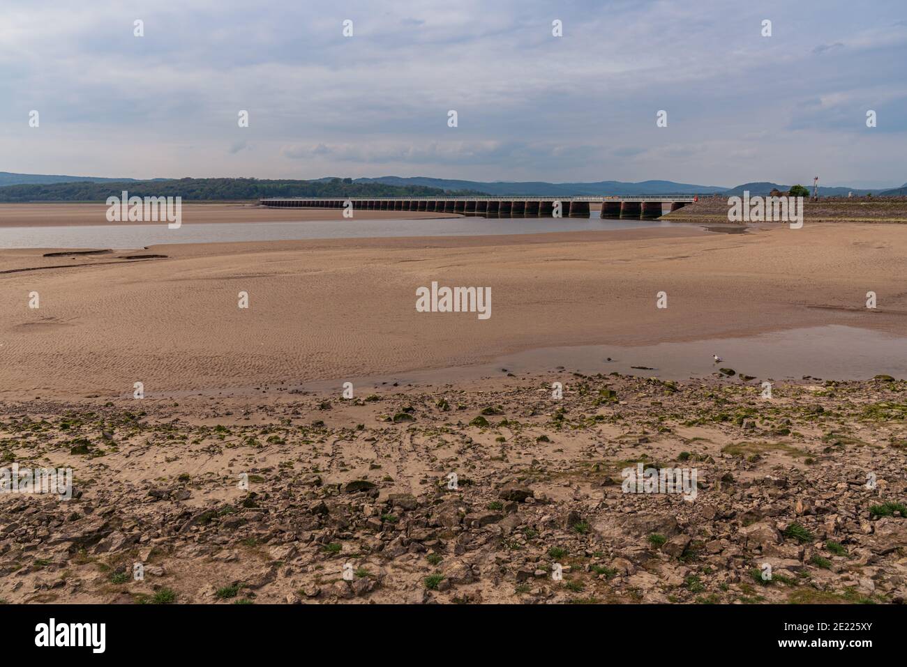 Looking at the railway bridge over the River Kent in Arnside, Cumbria ...