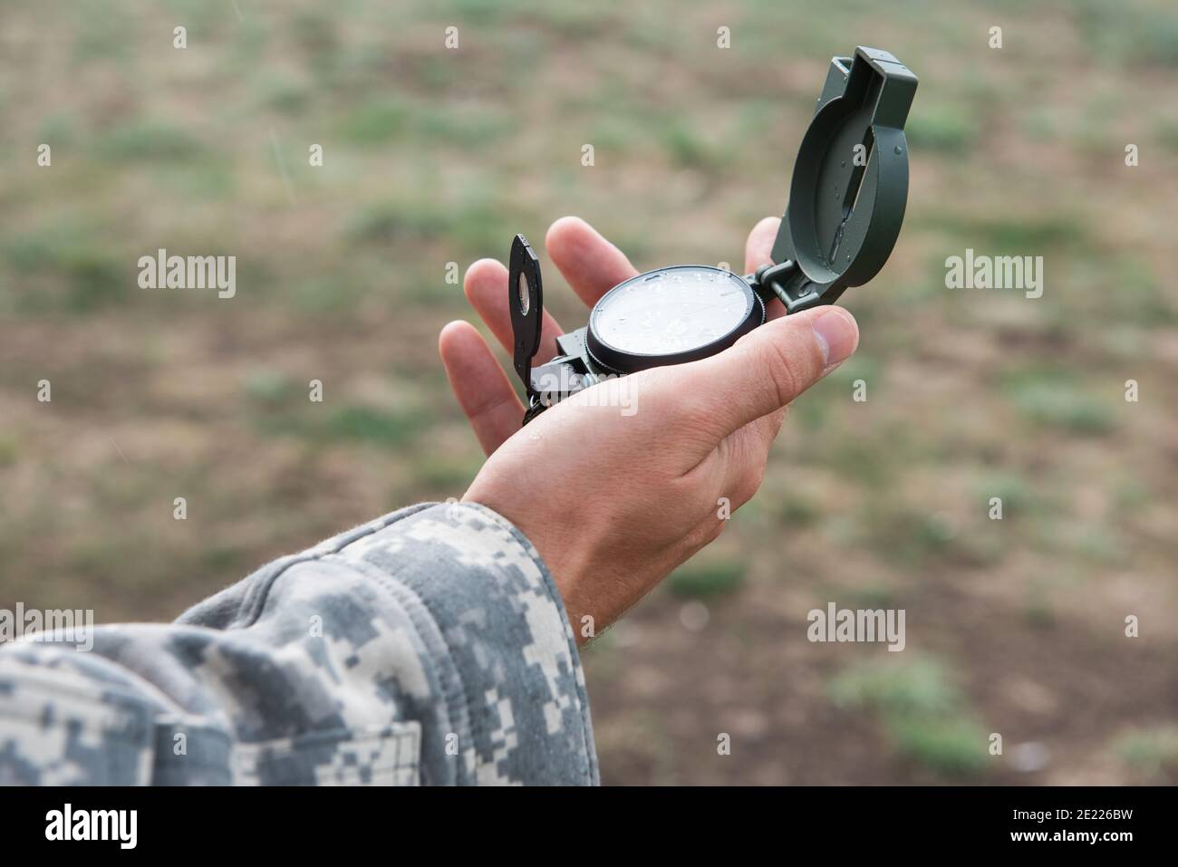 Man explorer searching direction compass hi-res stock photography and ...