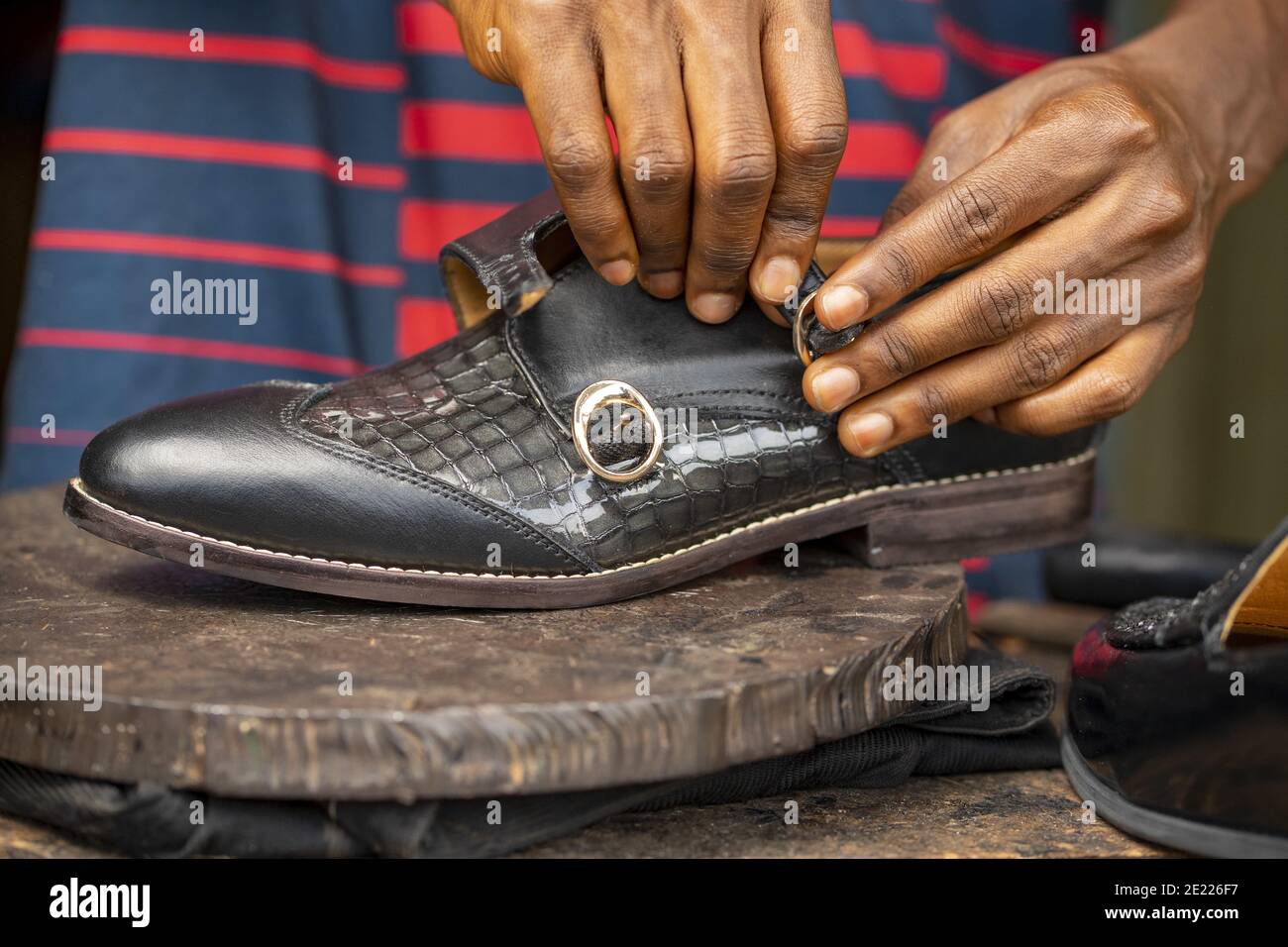 Closeup pair hands fixing hi-res stock photography and images - Alamy