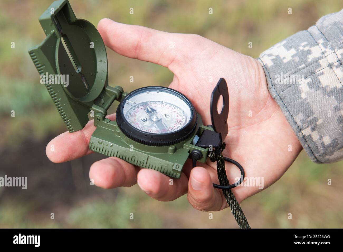 Compass grass magnet adventure hi-res stock photography and images - Alamy