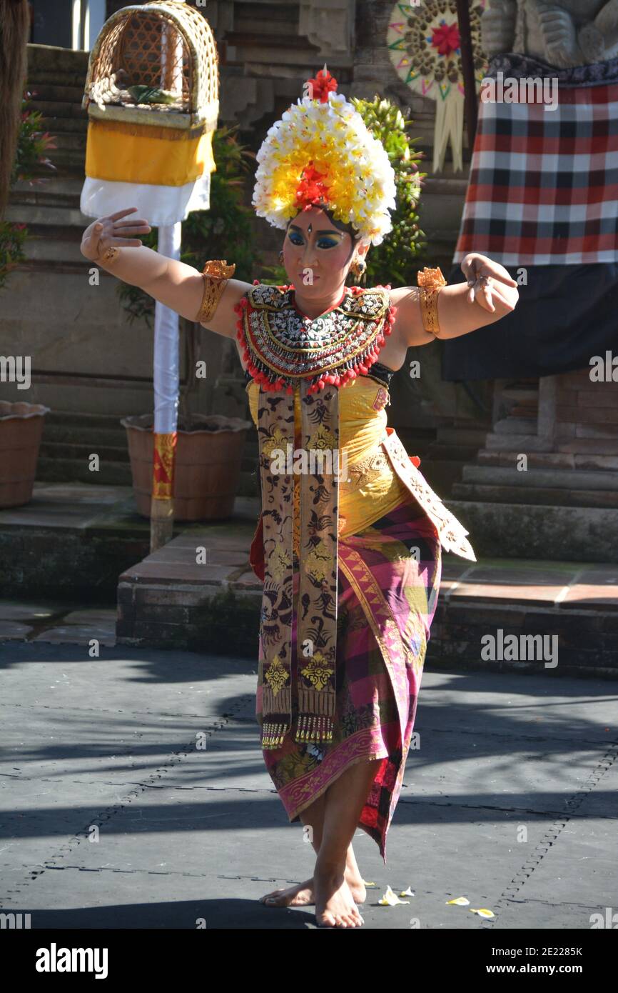 Balinese locals performing Barong, a mythical lion-like creature at a ...