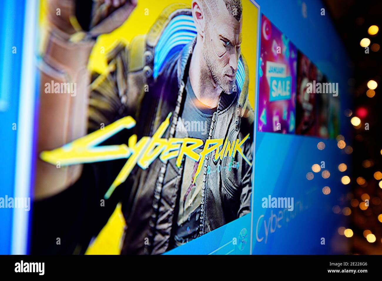 The Cyberpunk game is seen being installed on a Playstation 4 console ...