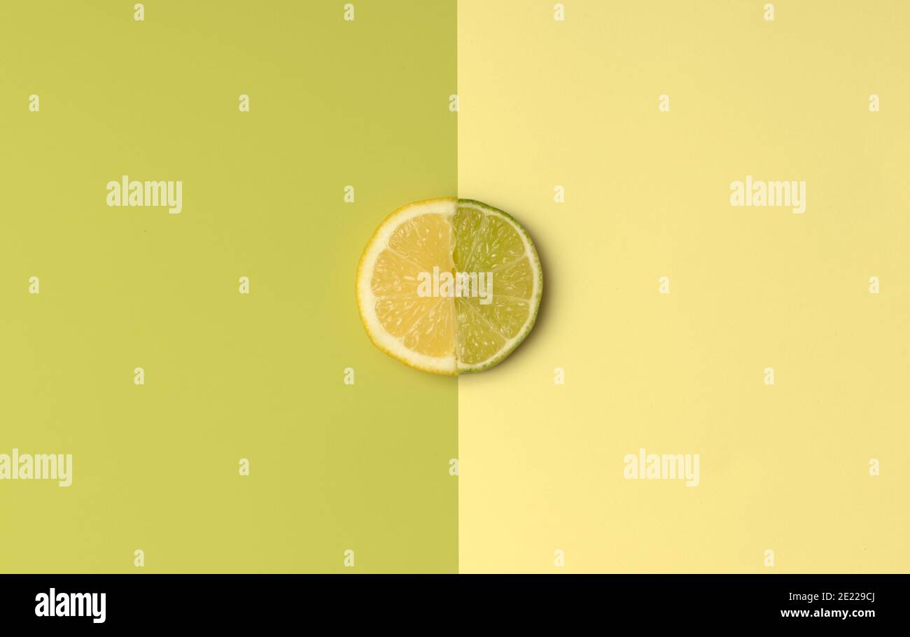 Half Lemon and Lime slice with green and yellow color opposite for ...
