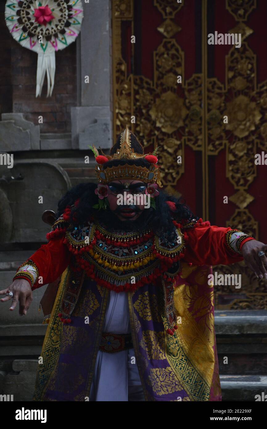 Balinese locals performing Barong, a mythical lion-like creature at a ...