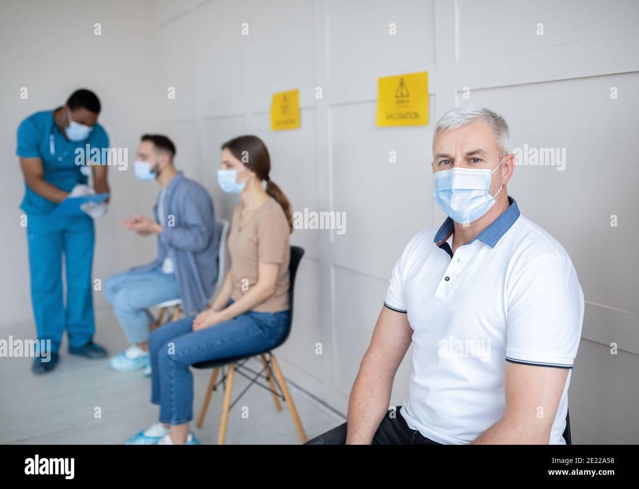 Vaccine queue hi-res stock photography and images - Alamy