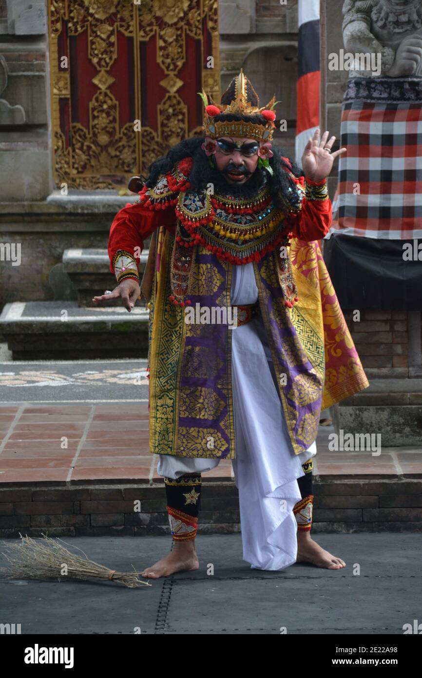 Balinese locals performing Barong, a mythical lion-like creature at a ...