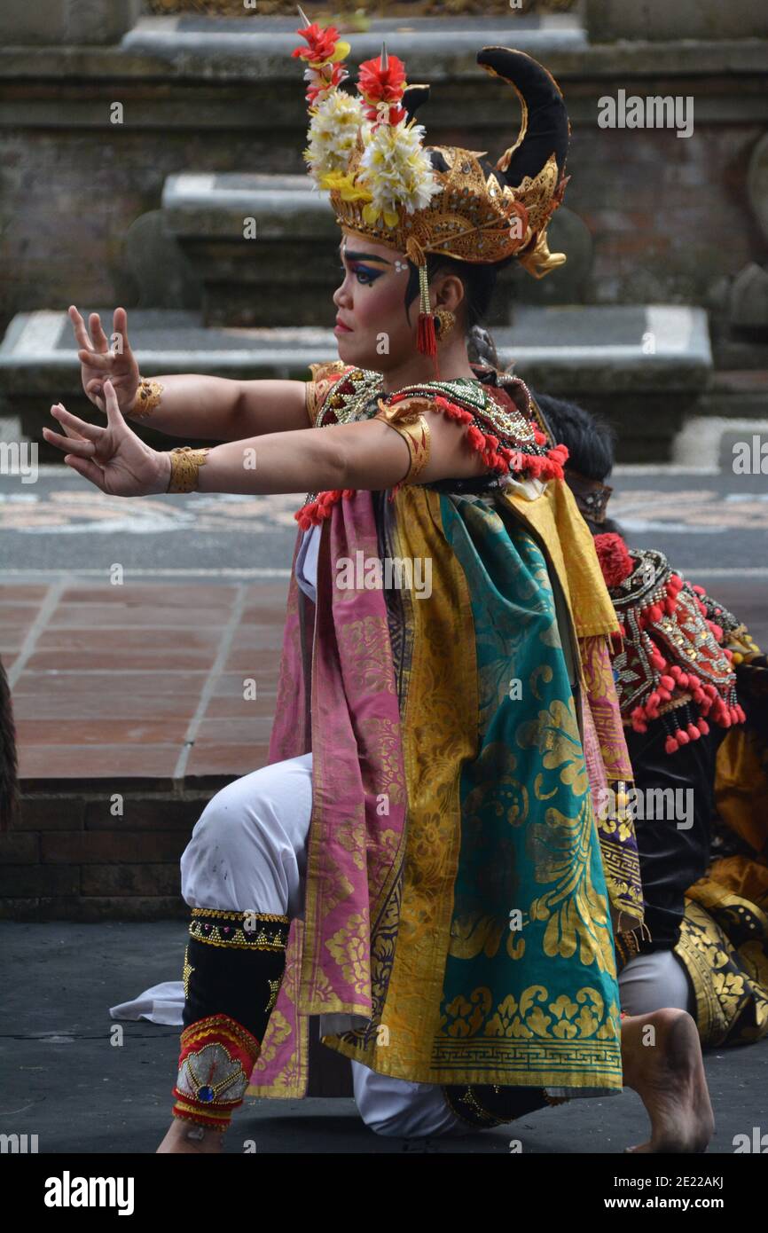 Balinese locals performing Barong, a mythical lion-like creature at a ...
