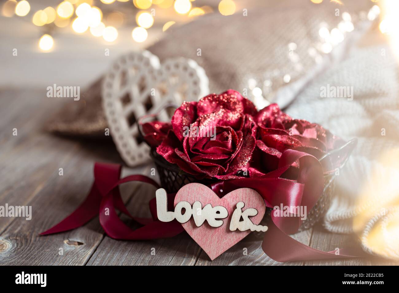 Festive still life with the inscription love it with decor details on a ...