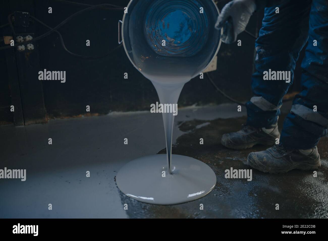 Epoxy resin floor preparation first layer inside the building Stock ...