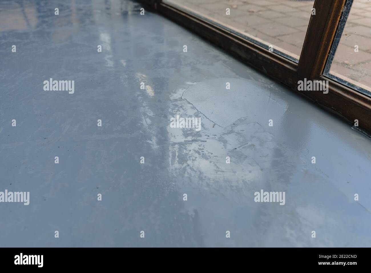 Epoxy resin floor preparation first layer inside the building Stock ...