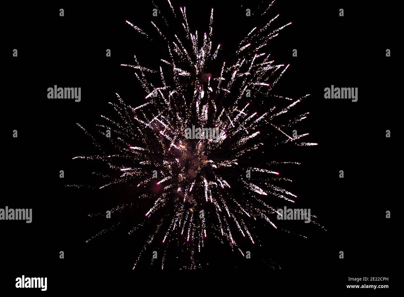 Fireworks exploding against the night sky Stock Photo - Alamy