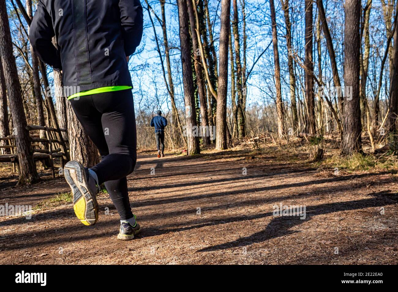 Jogging scene in a public park Stock Photo - Alamy