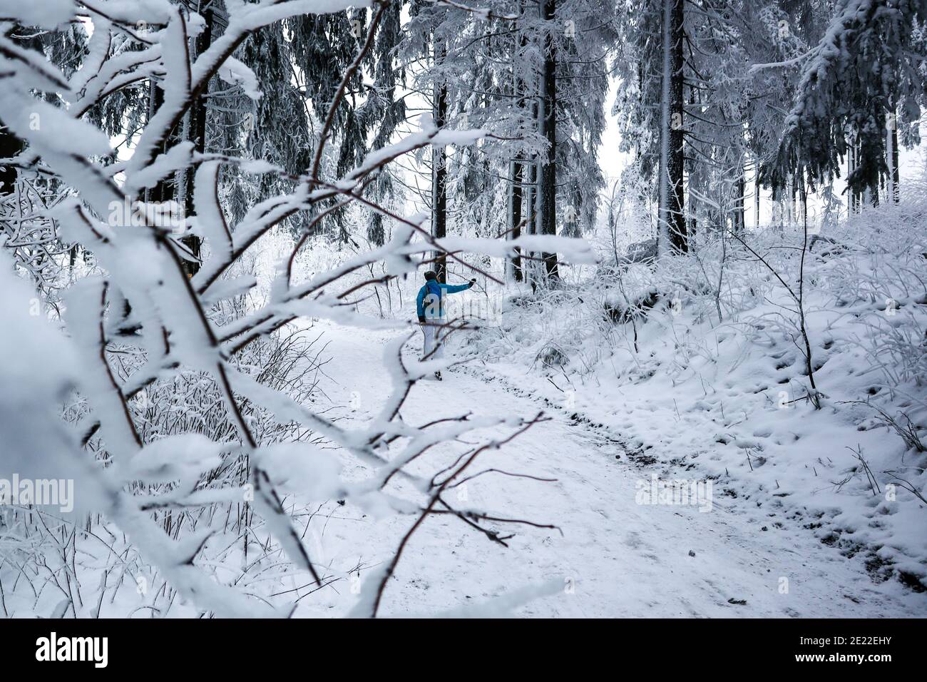 Beautiful winter scenery with a girl and lots of snow in the german ...