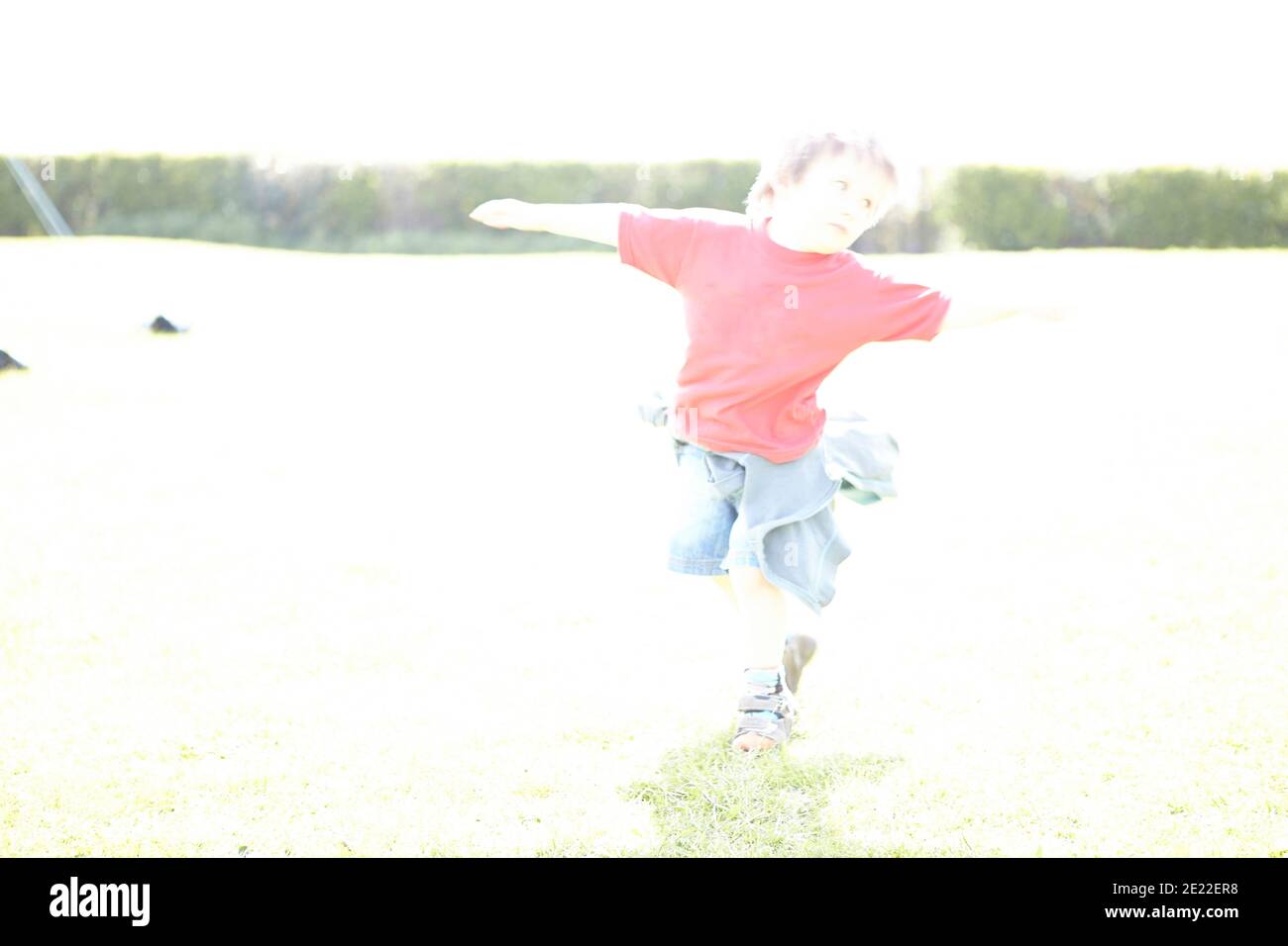 child playing spinning running Stock Photo - Alamy