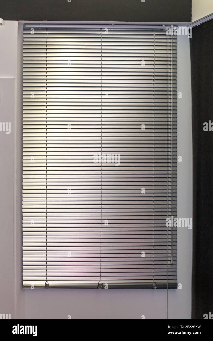 Modern Silver Aluminium Metal Venetian Window Blinds Stock Photo - Alamy