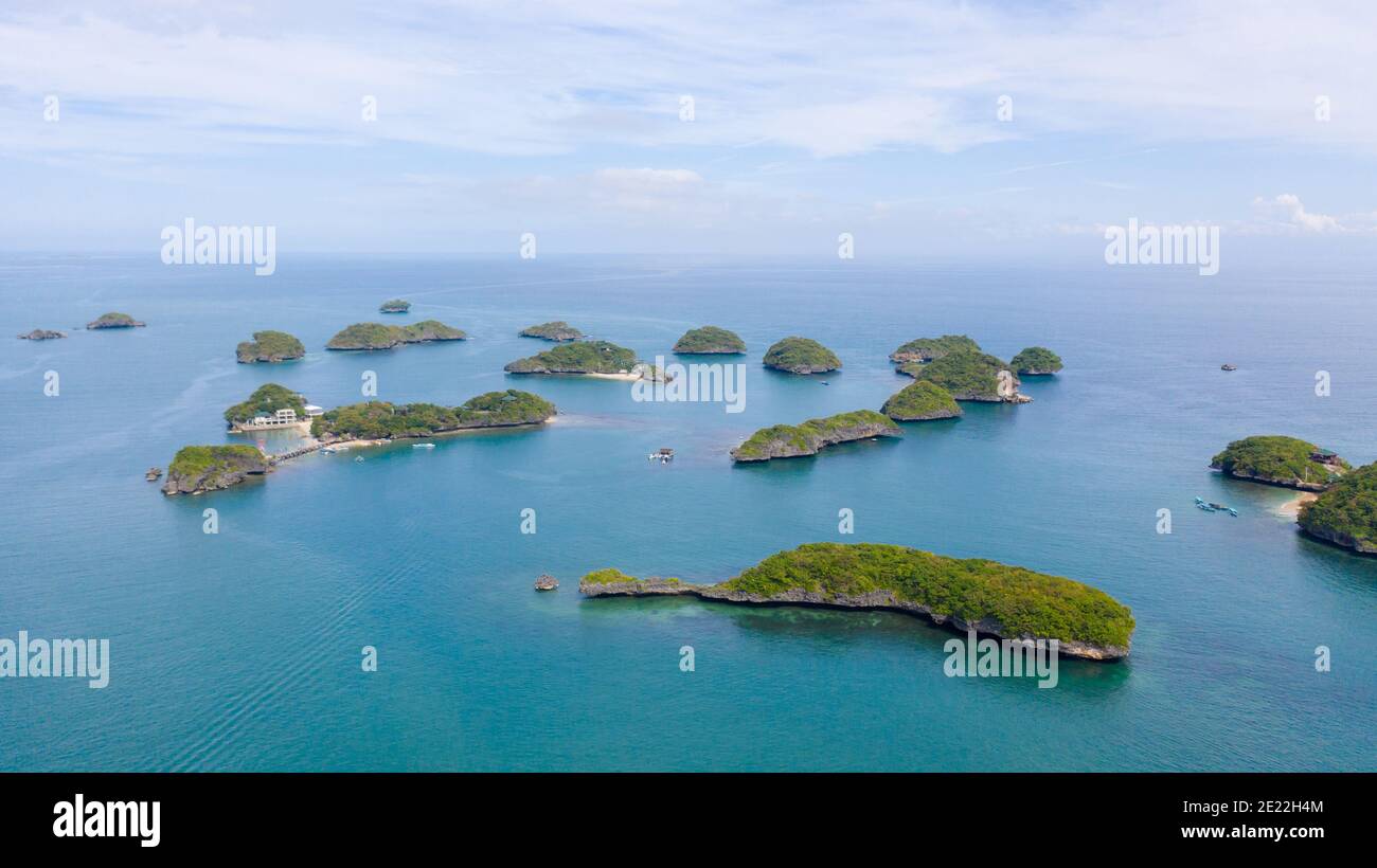 Aerial view of Small islands with beaches and lagoons in Hundred Islands National Park ...