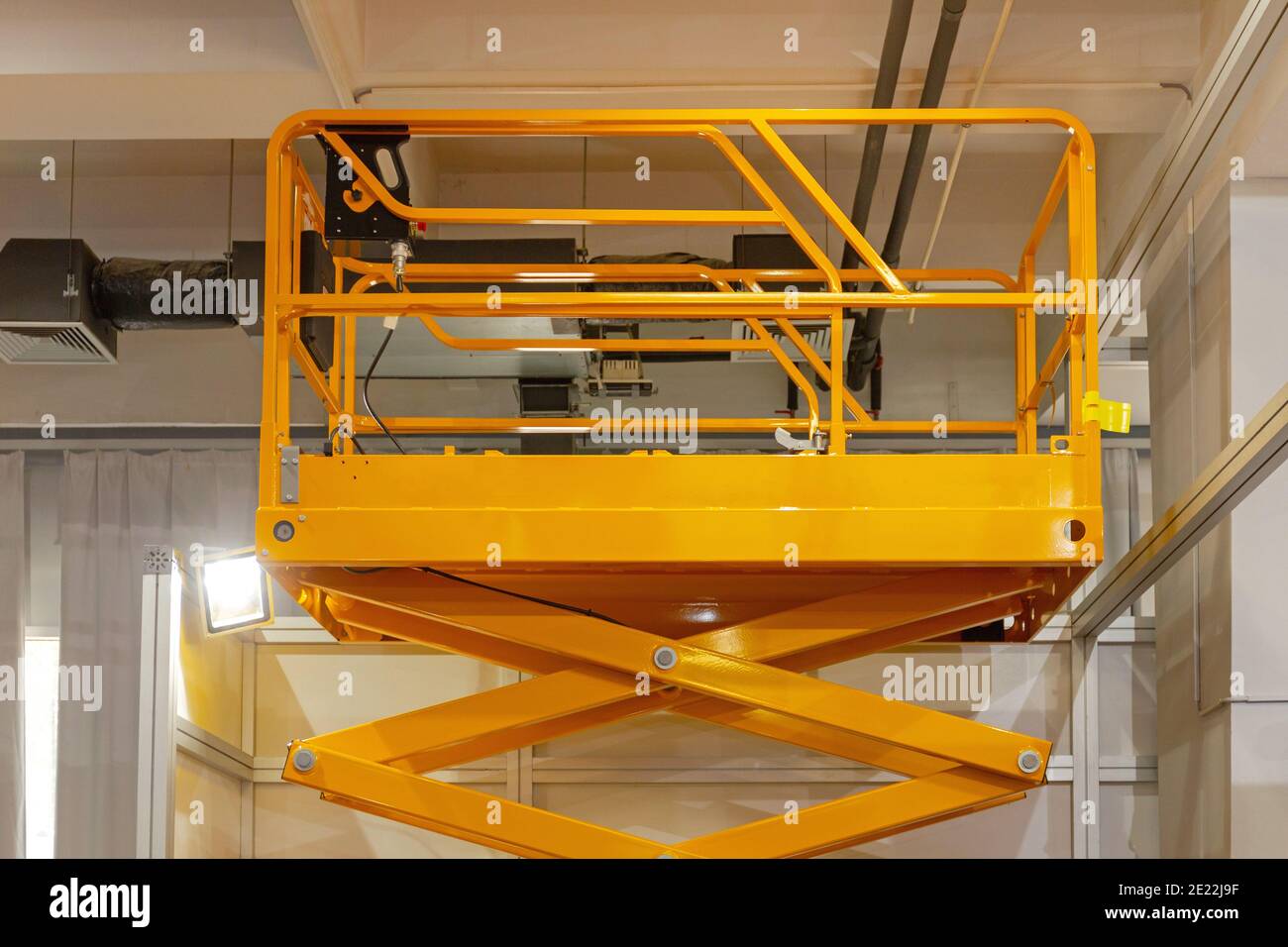 Elevated Work Platform Scissor Lift Inside Building Stock Photo - Alamy