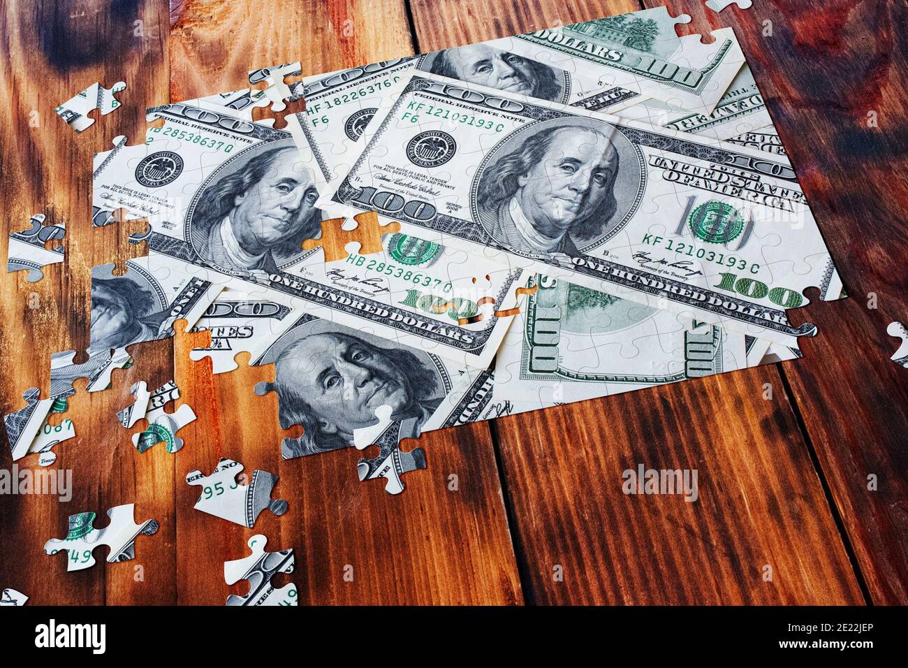 100 dollar bill puzzle hi-res stock photography and images - Alamy