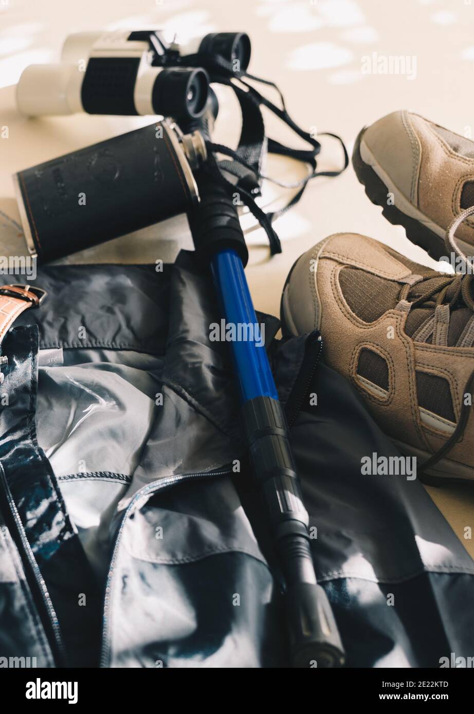 Vertical shot of hiking objects: a hiking at sunlight Stock Photo - Alamy